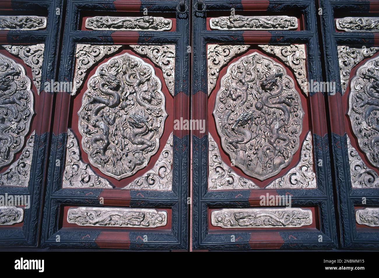 Dragon designs are seen on the entrance gates to the Forbidden City in ...