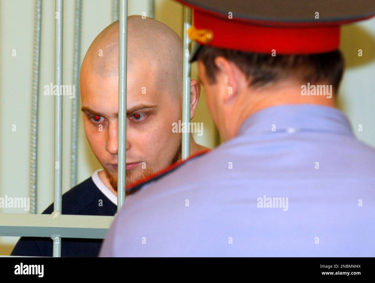 Leader of a neo-Nazi gang Alexei Voyevodin seen during reading of a ...