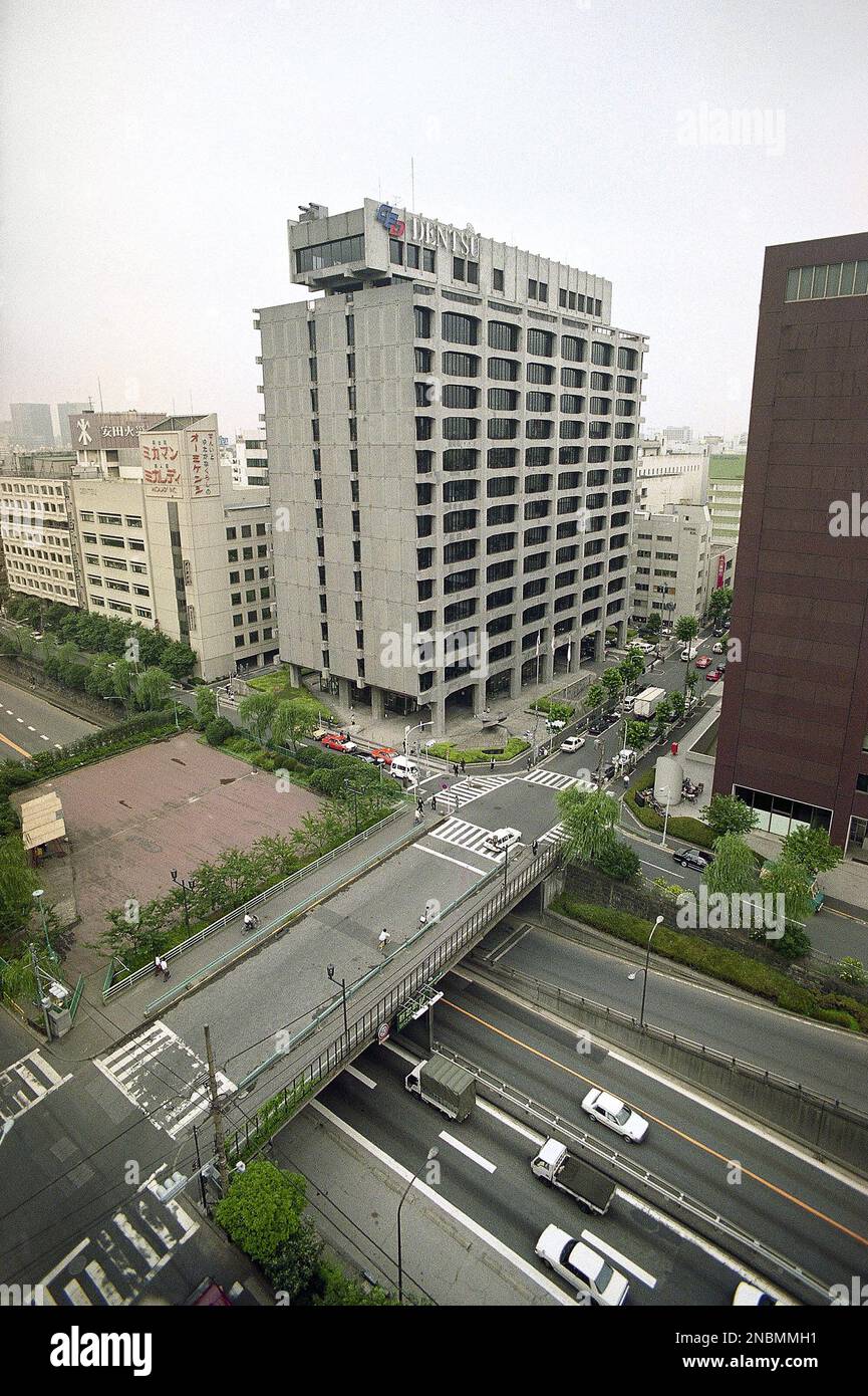 The Tokyo head office of Dentsu, Japan’s advertising giant stands tall ...