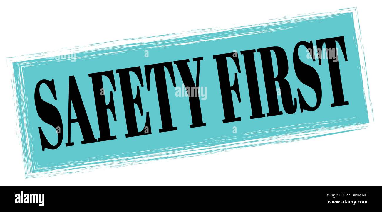SAFETY FIRST text written on blue-black rectangle stamp sign Stock ...