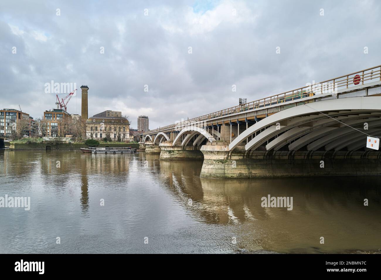 Grosvenor rail bridge over the river Thames at Nine Elms, London ...