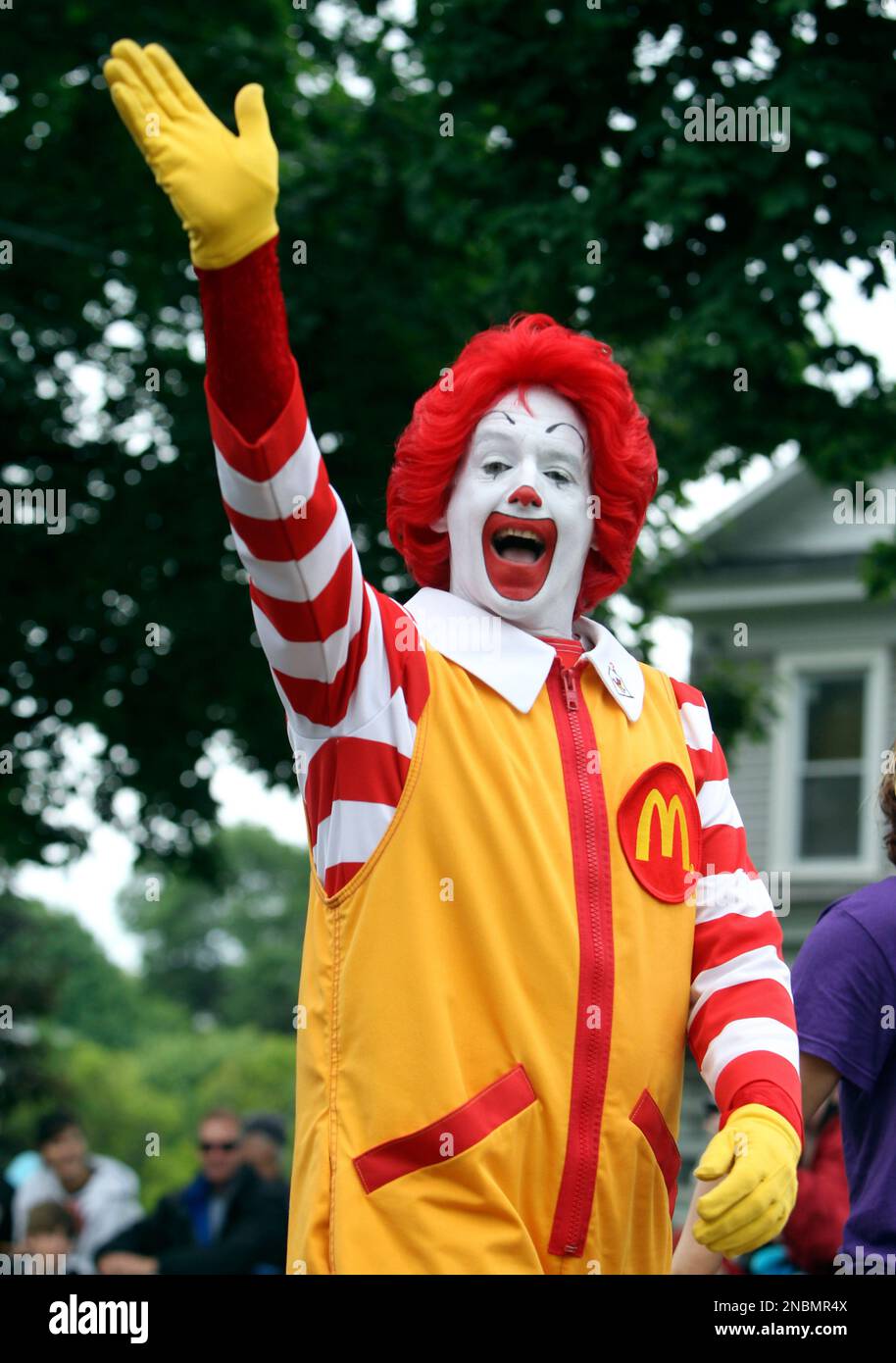 Ronald McDonald waves at the Boxing Hall of Fame parade in Canastota, N ...