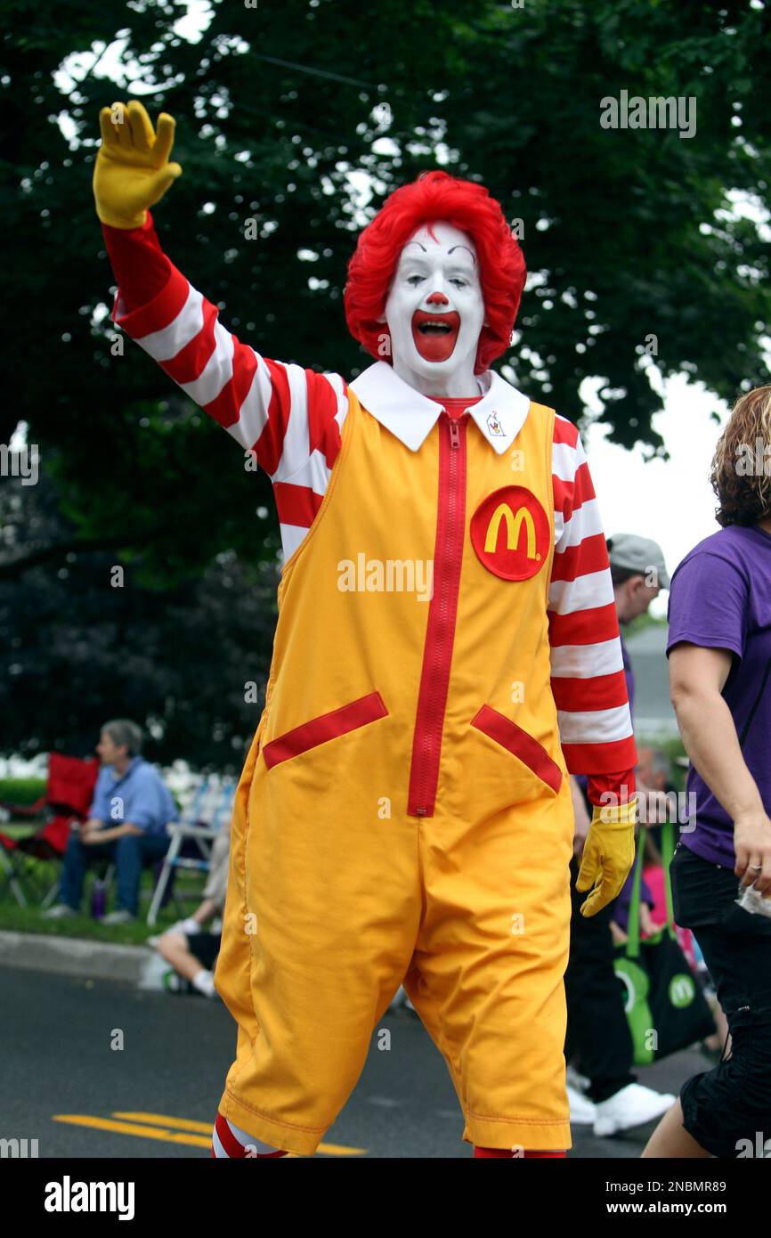 Ronald McDonald waves at the Boxing Hall of Fame parade in Canastota, N ...