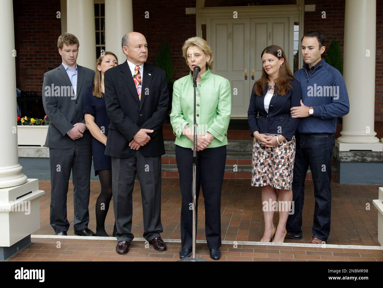 Washington Gov. Chris Gregoire, third from right, stands with her ...