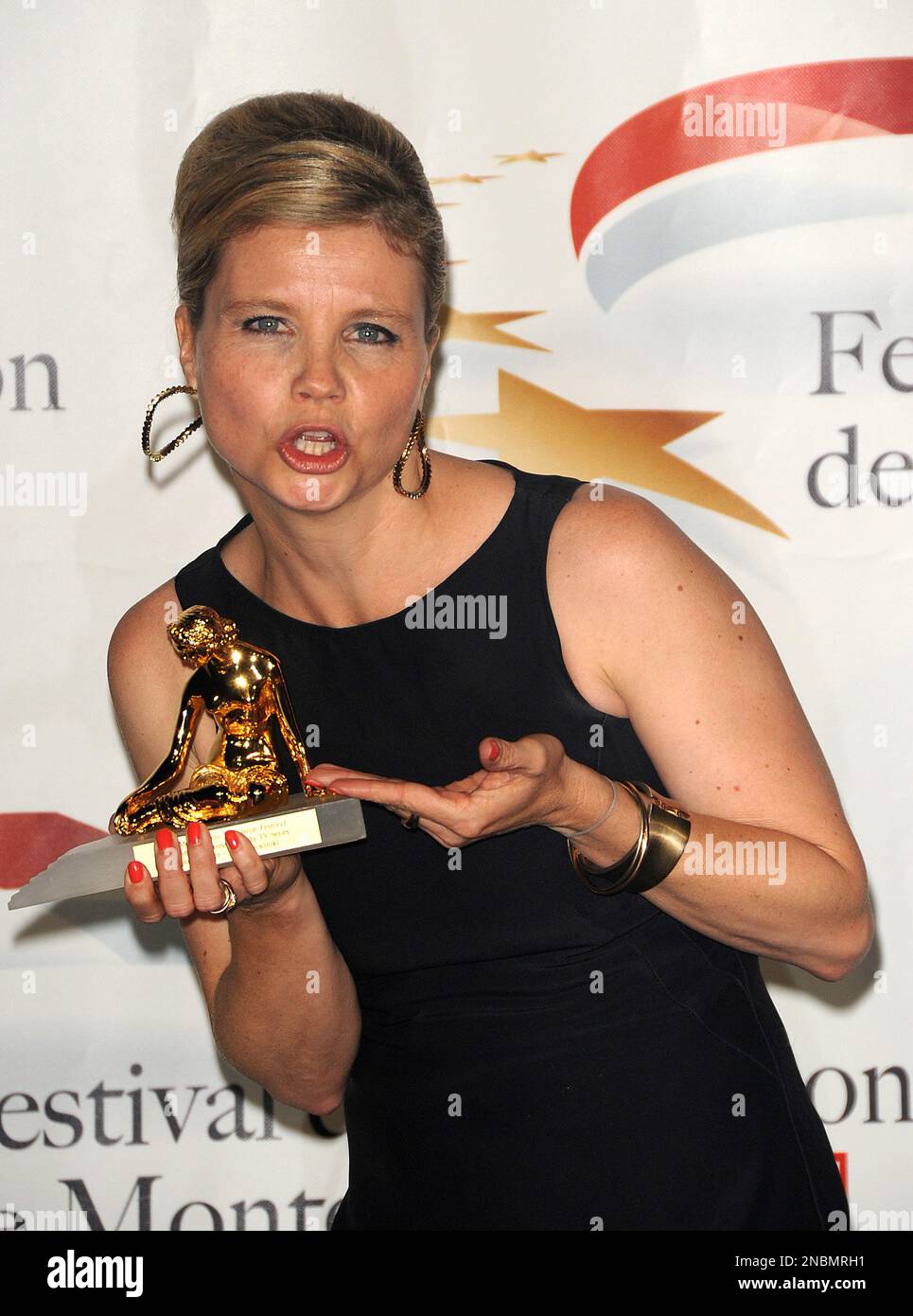 German actress Annette Frier poses with her Golden Nymphe award after ...
