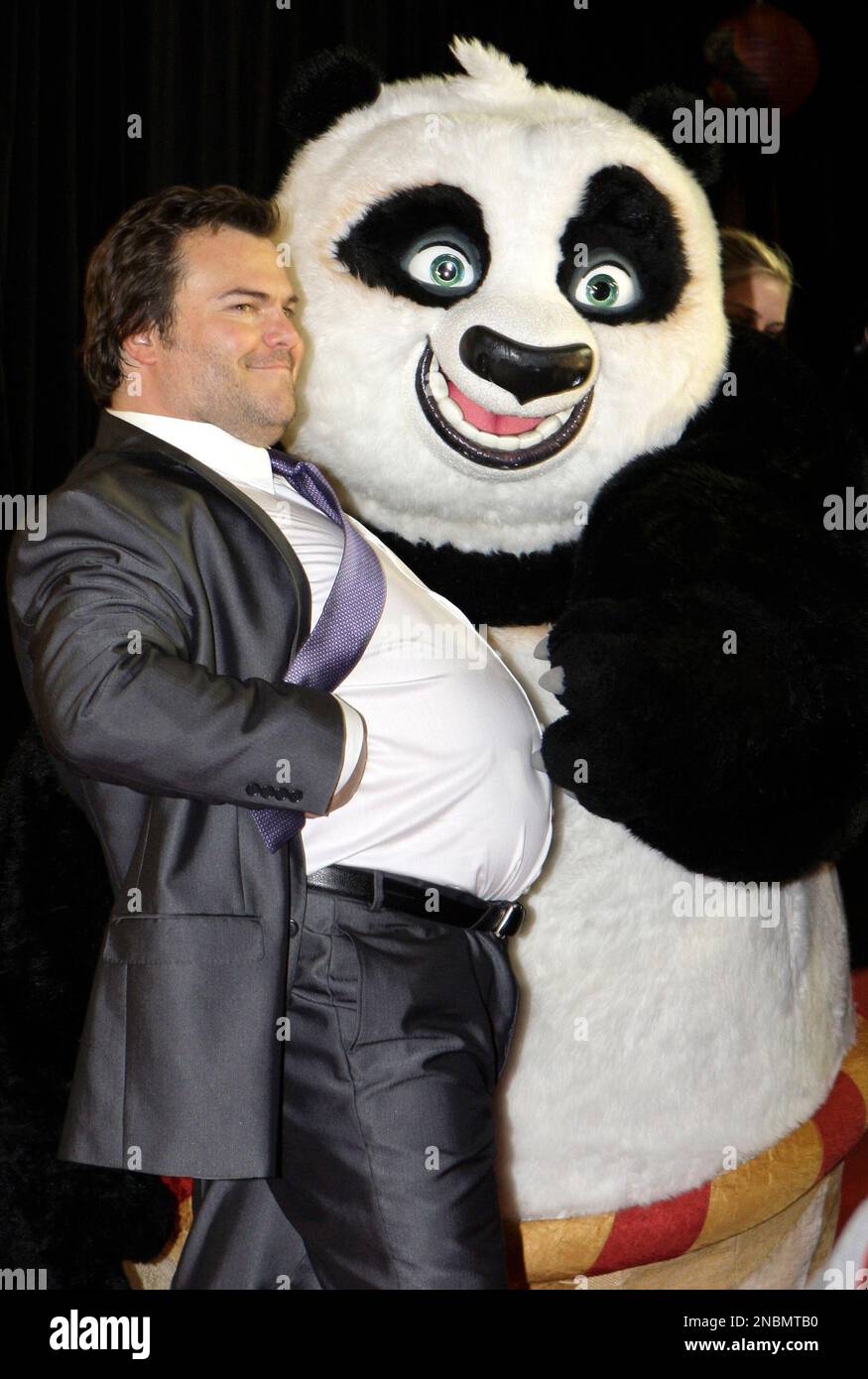 U.S. actor Jack Black poses with a panda character as he attends the ...