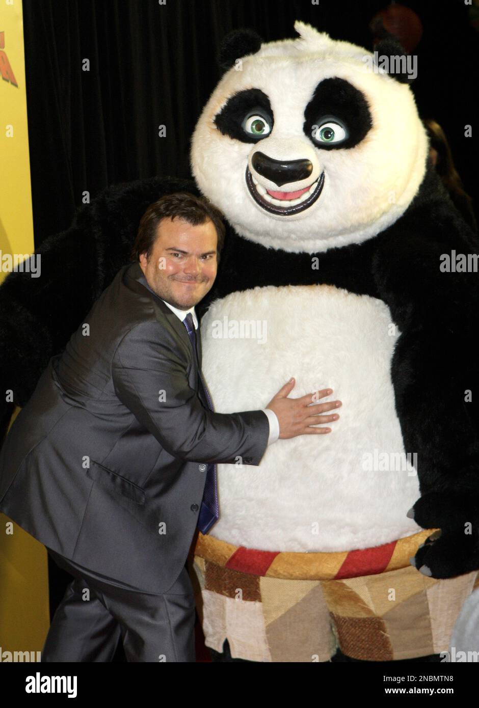 U.S. actor Jack Black poses with a panda character as he attends the ...