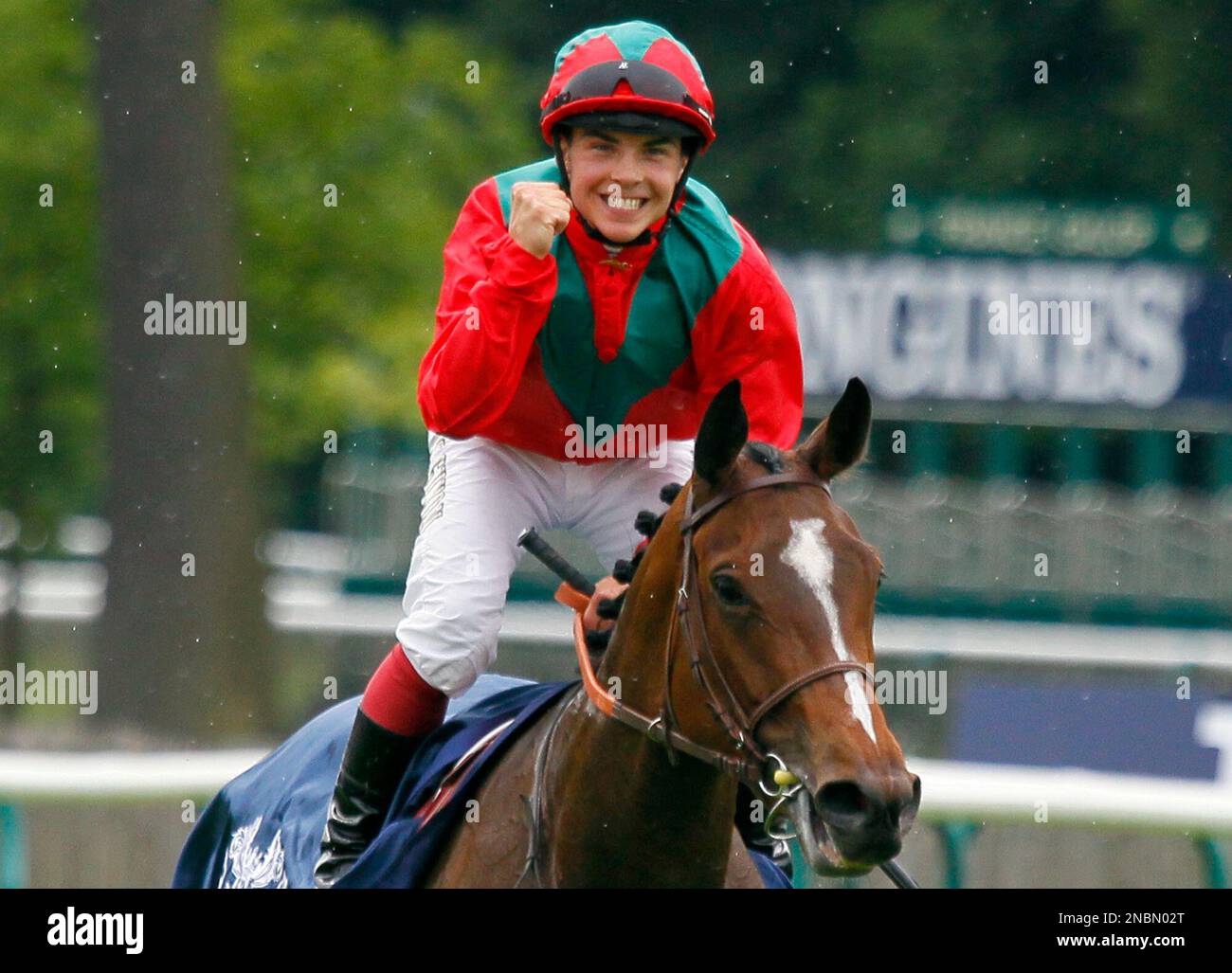 French jockey Maxime Guyon riding Golden Lilac reacts after he wins the ...