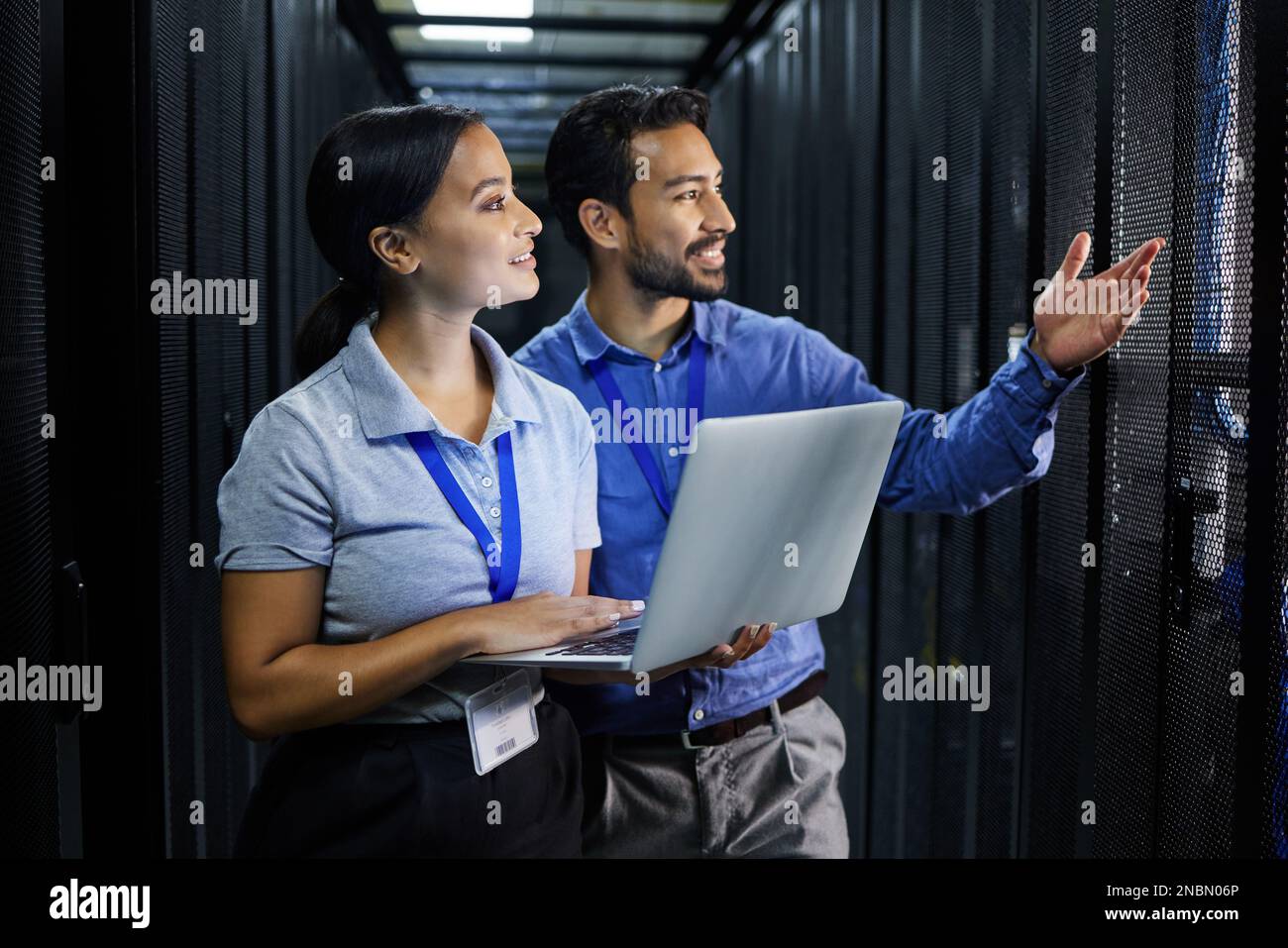Server room, laptop and manager people or technician in data center ...