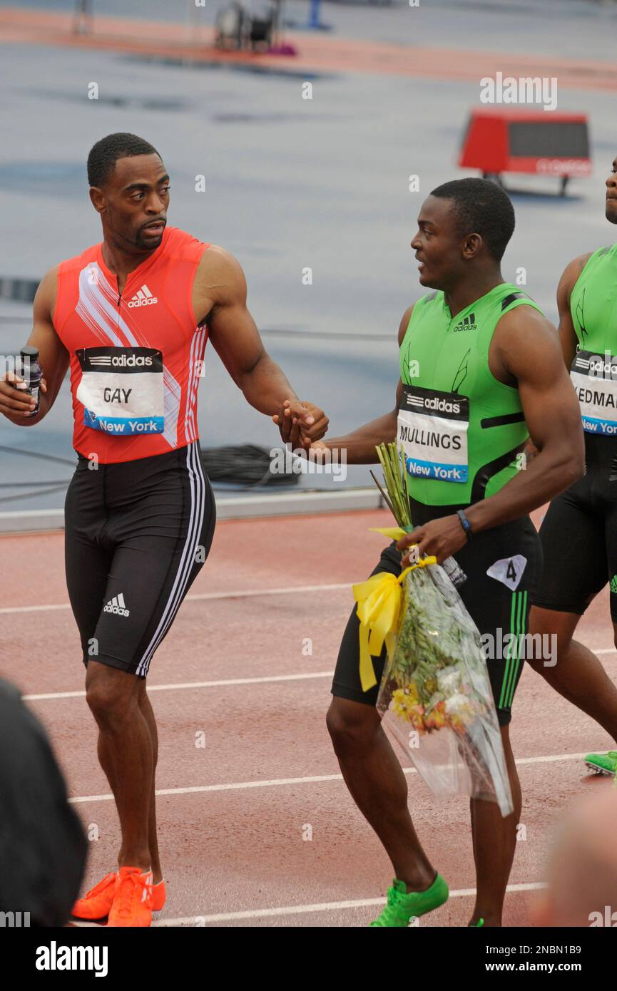Jamaica's Steve Mullings, right, won the 100 meter race over Tyson Gay ...