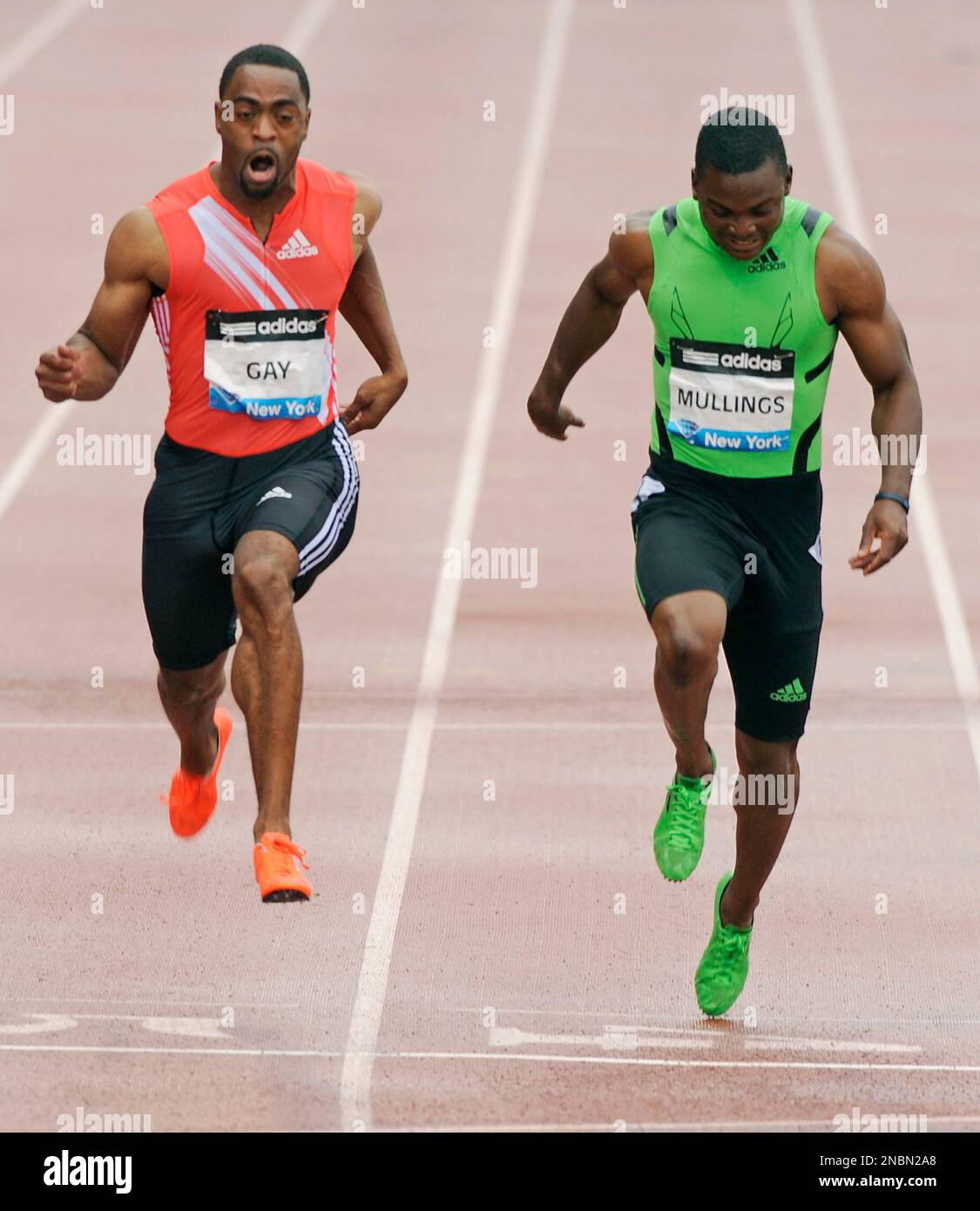 Jamaica's Steve Mullings, right, won the 100-meter race over Tyson Gay ...