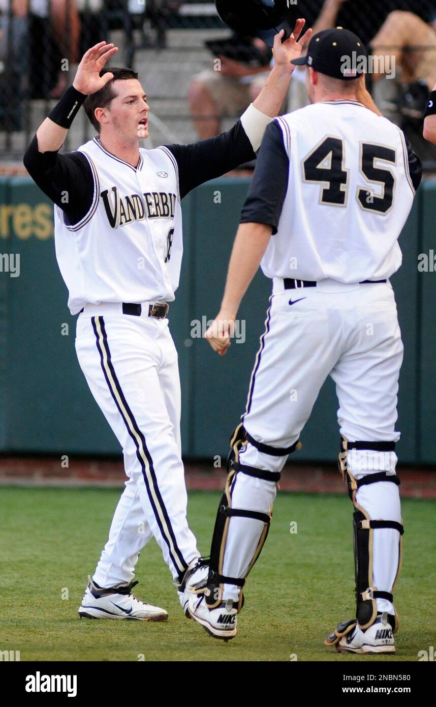 Vanderbilt's Mike Yastrzemski, left, is congratulated by teammate Drew ...