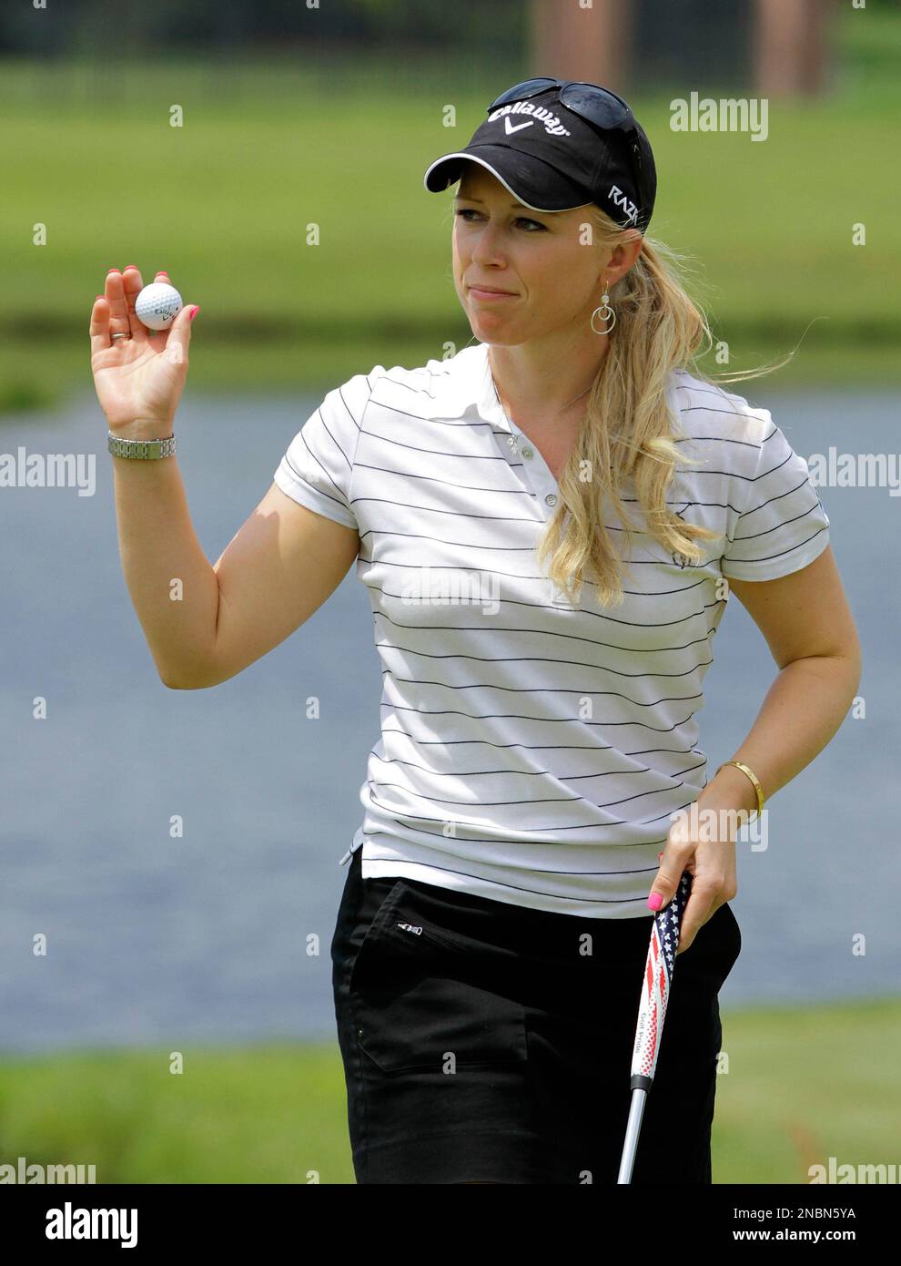 Morgan Pressel waves to the gallery on the 18th hole during the second ...
