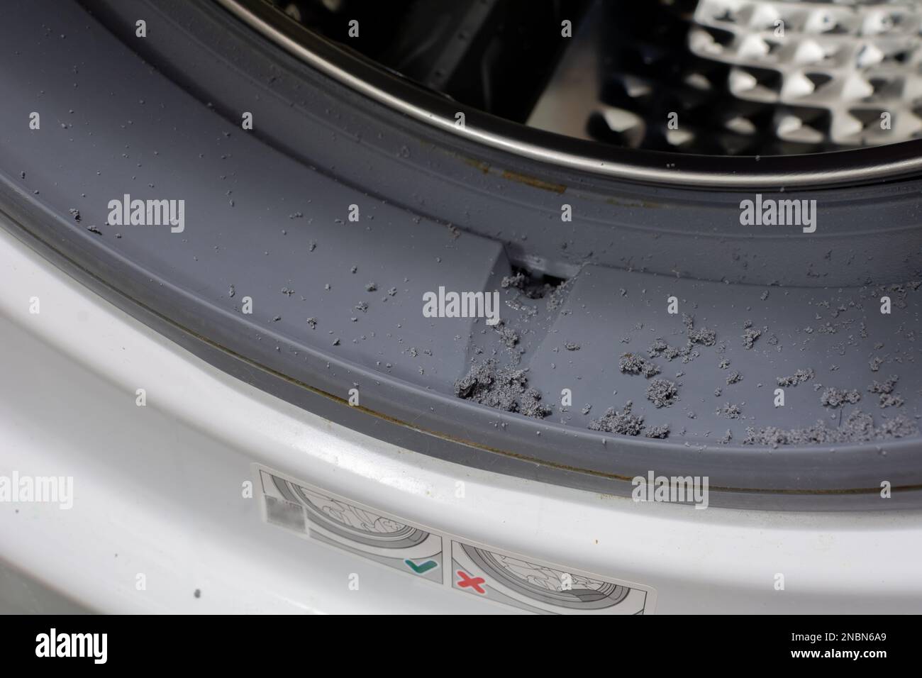 Rubber breadcrumbs same colour as drum seal after washing machine cycle ...