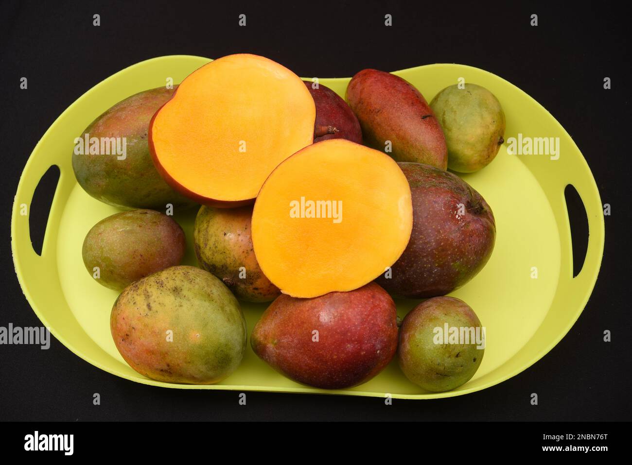 Fresh mango fruits in an isolated background Stock Photo - Alamy
