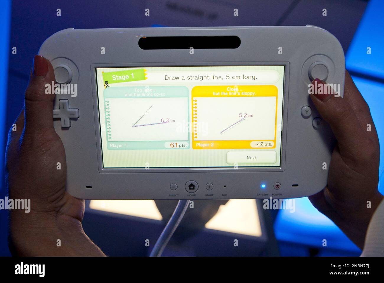Nintendo's next video game console, the Wii U, is demonstrated with the ...
