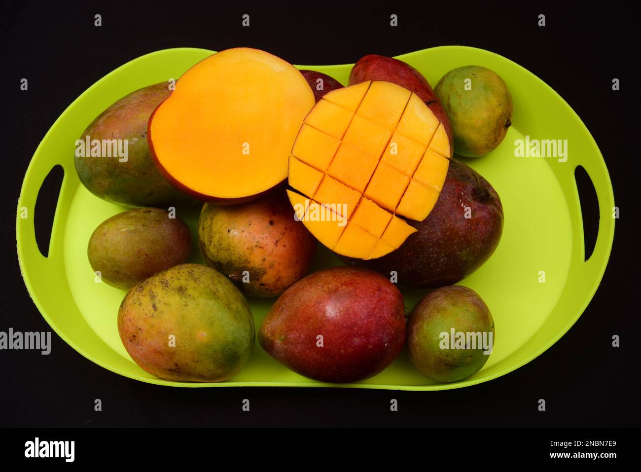 Fresh mango fruits in an isolated background Stock Photo - Alamy
