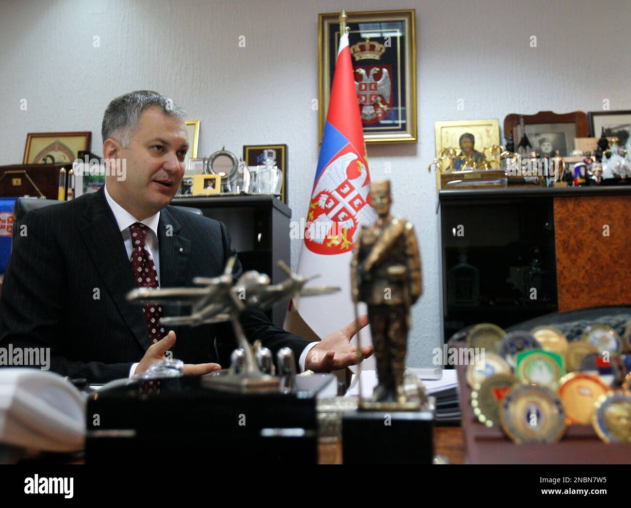 Serbia's Defense Minister Dragan Sutanovac speaks and gestures during ...
