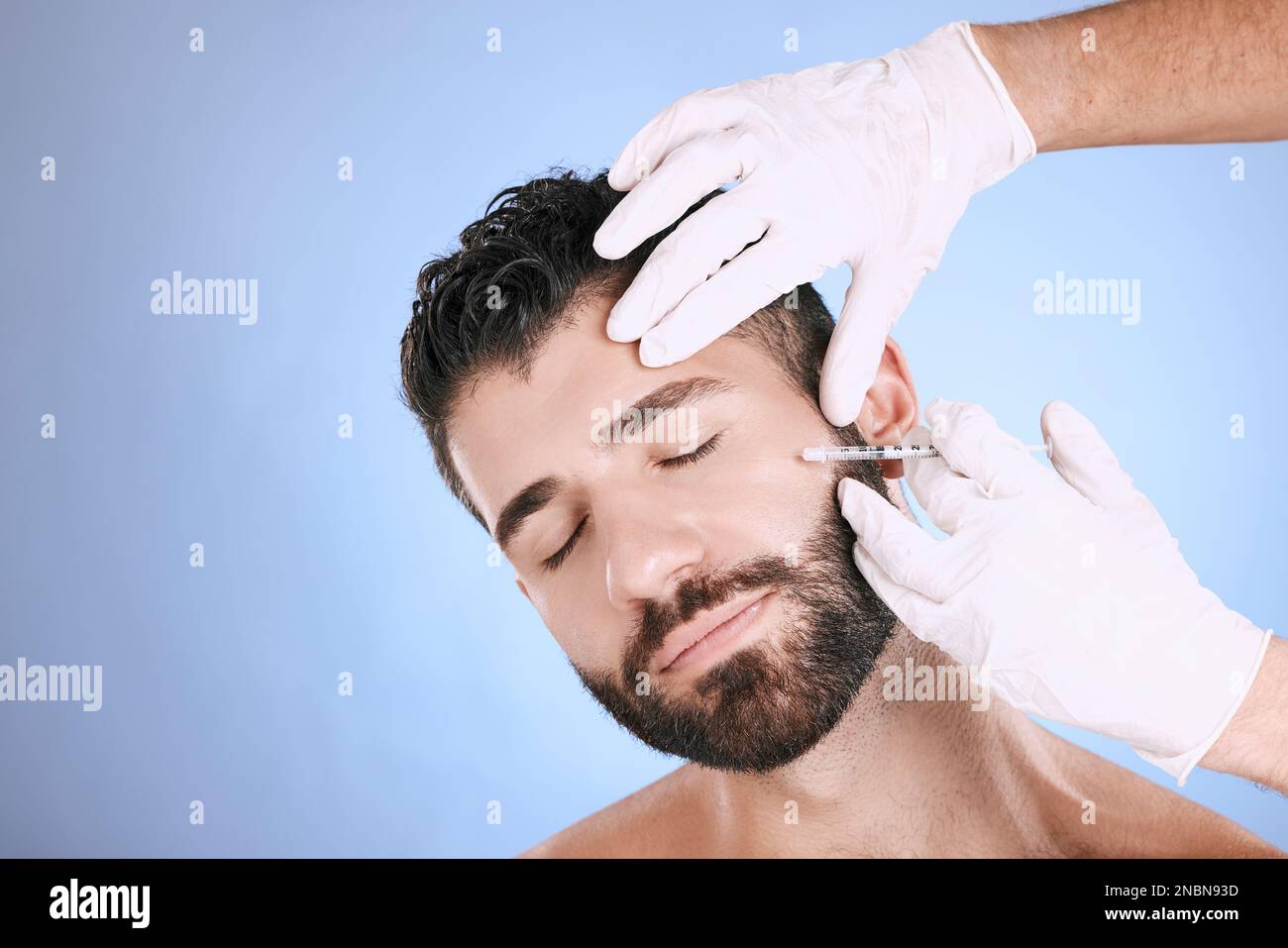 Needle, man and skincare in studio for beauty, botox and aesthetic on ...