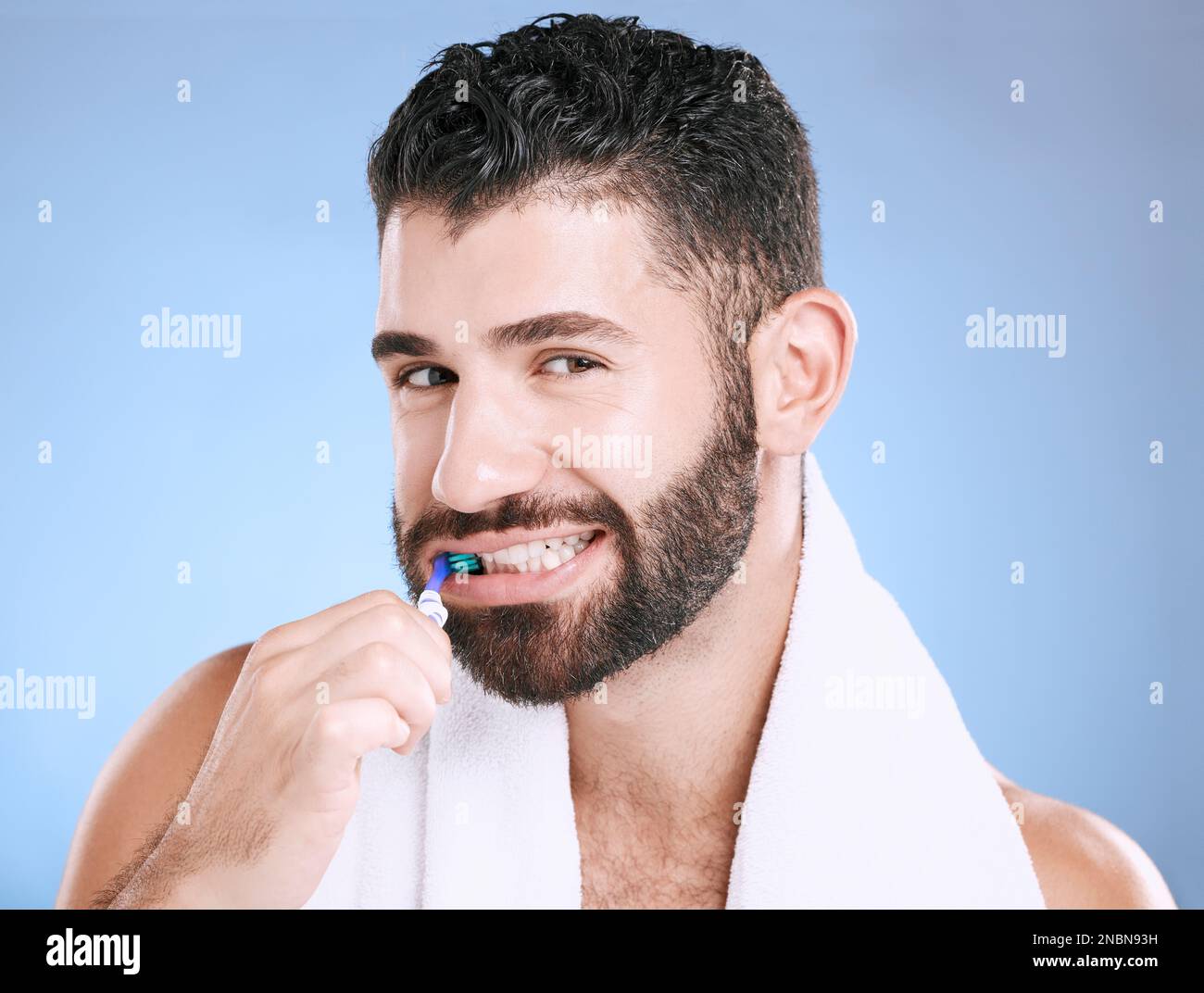 Studio portrait, man and toothbrush for teeth, dental wellness and ...