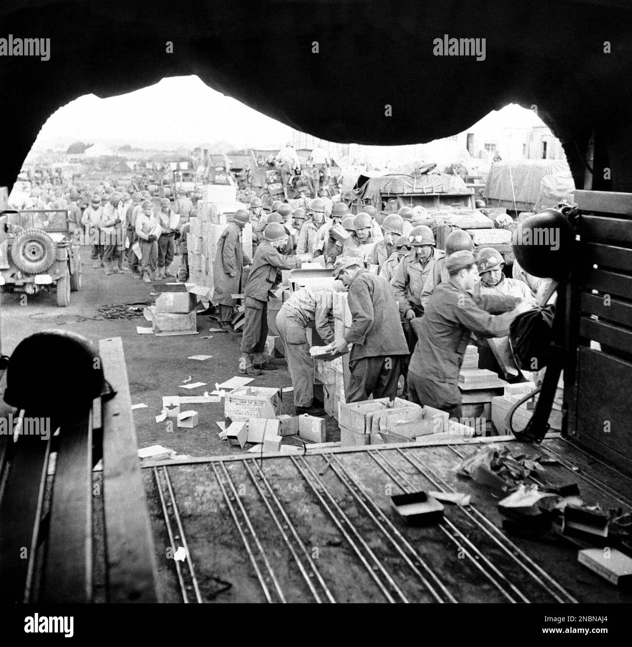 Assault troops line up for special supplies, including candy and ...