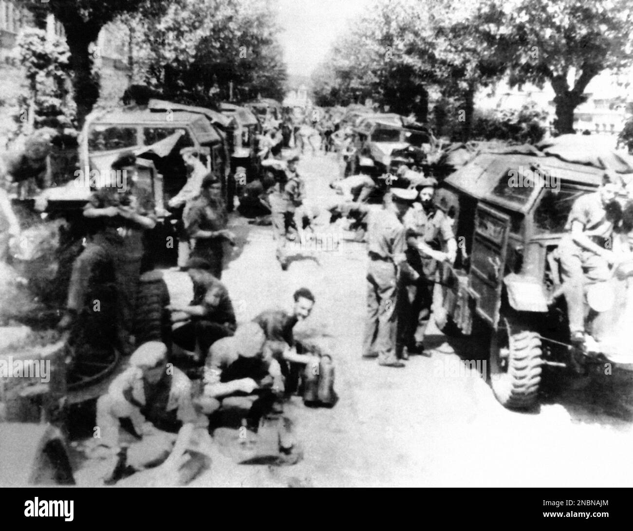 Waiting somewhere in England on June 5, 1944 are these Allied soldiers ...
