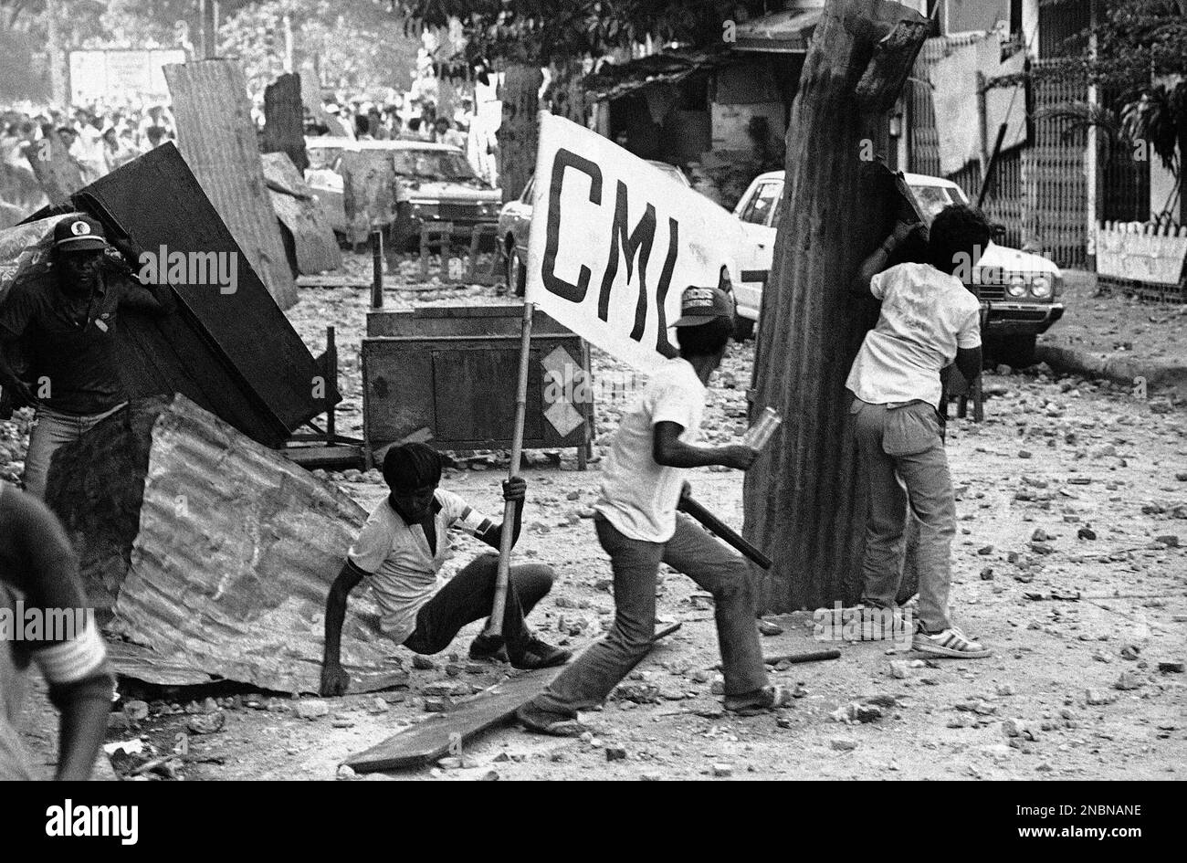 Supporters of ousted Philippine President Ferdinand Marcos prepare to ...