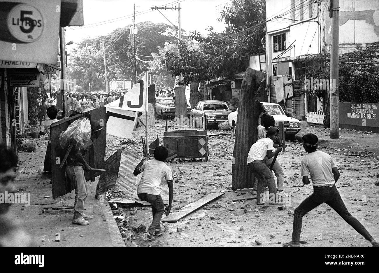 Supporters of ousted Philippine President Ferdinand Marcos use ...