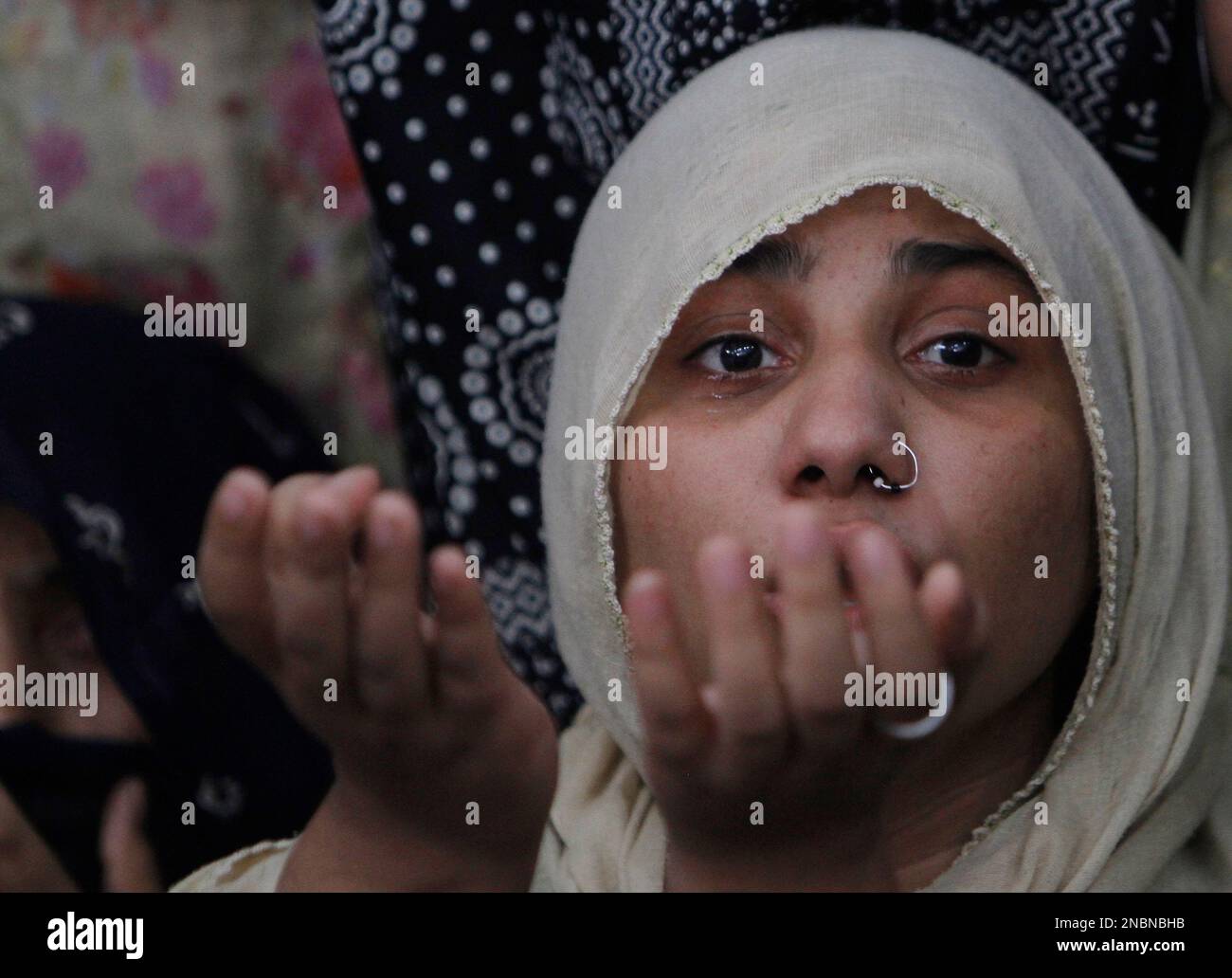 A family member of the allegedly executed boy mourns his death in ...