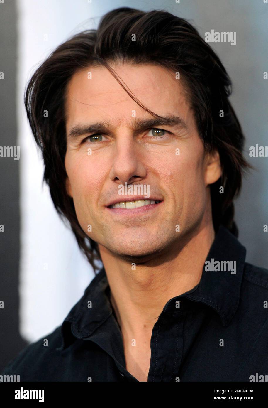 Actor Tom Cruise poses for photographers at the premiere of the film ...