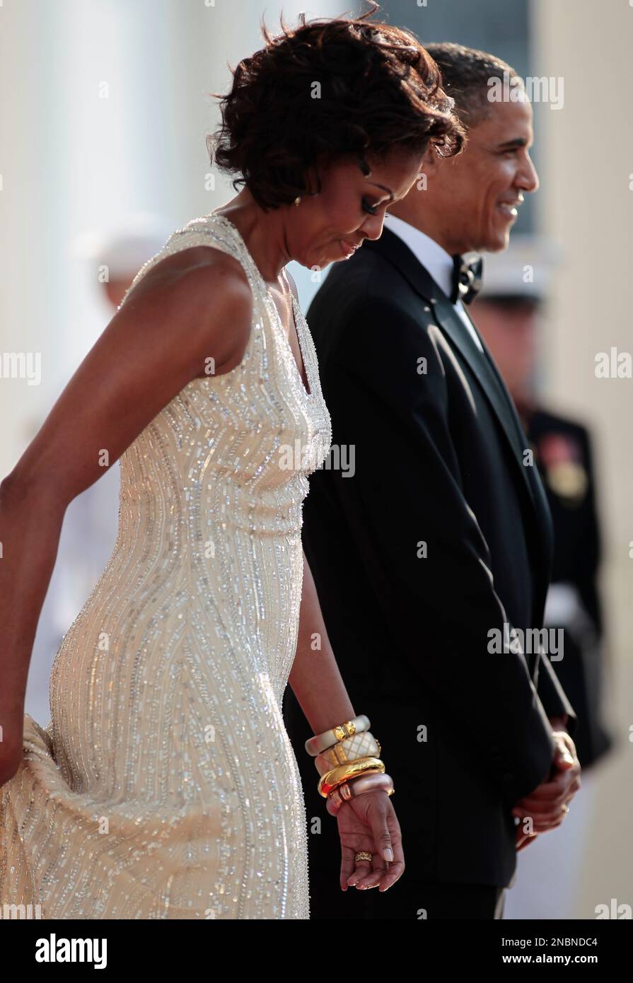 First lady Michelle Obama and President Barack Obama wait for the ...