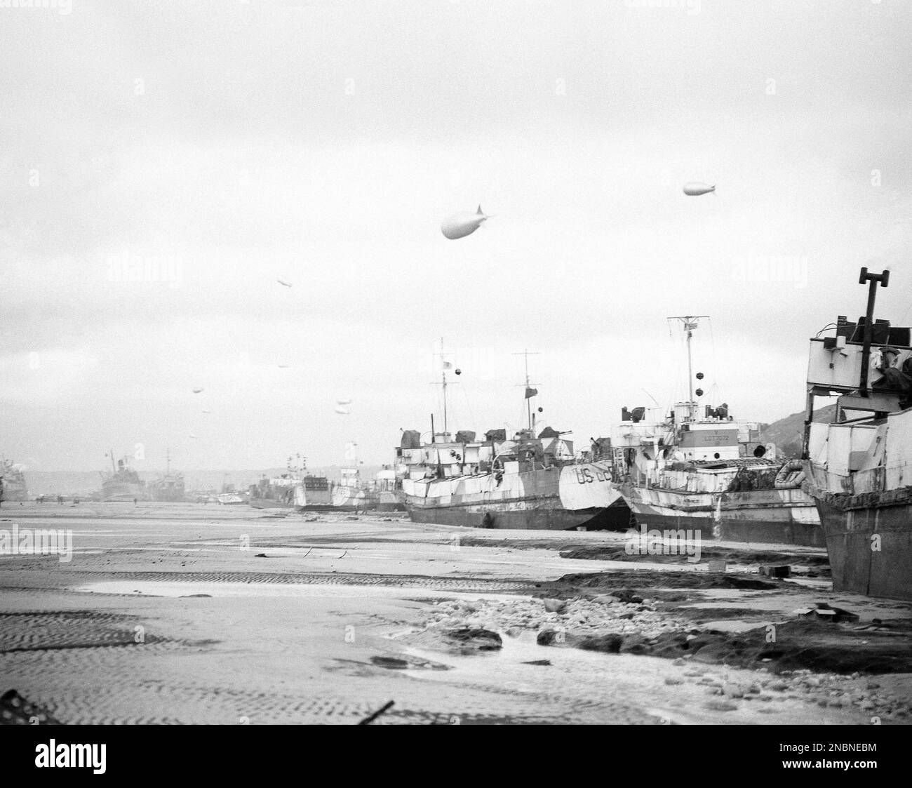 Barrage balloons float over a Normandy beachhead, France on August 20, 1944, where a storm ...