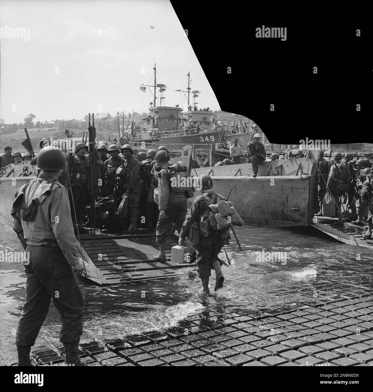 American troops embarking in landing craft at a British port on June 6 ...