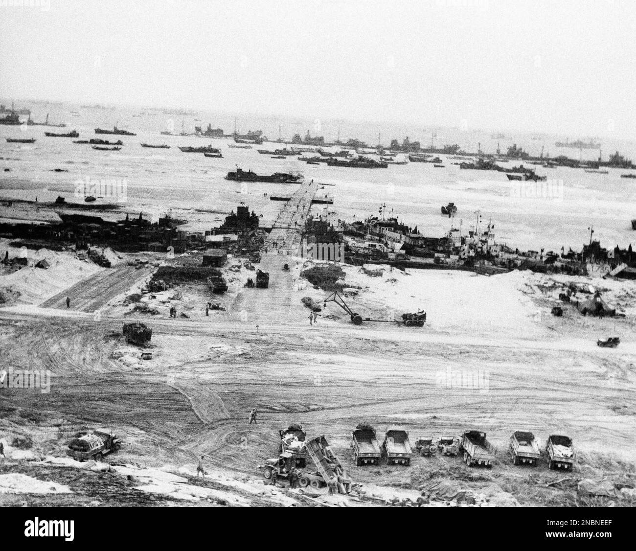 Ships of many classes lie beached and grounded at the Normandy ...