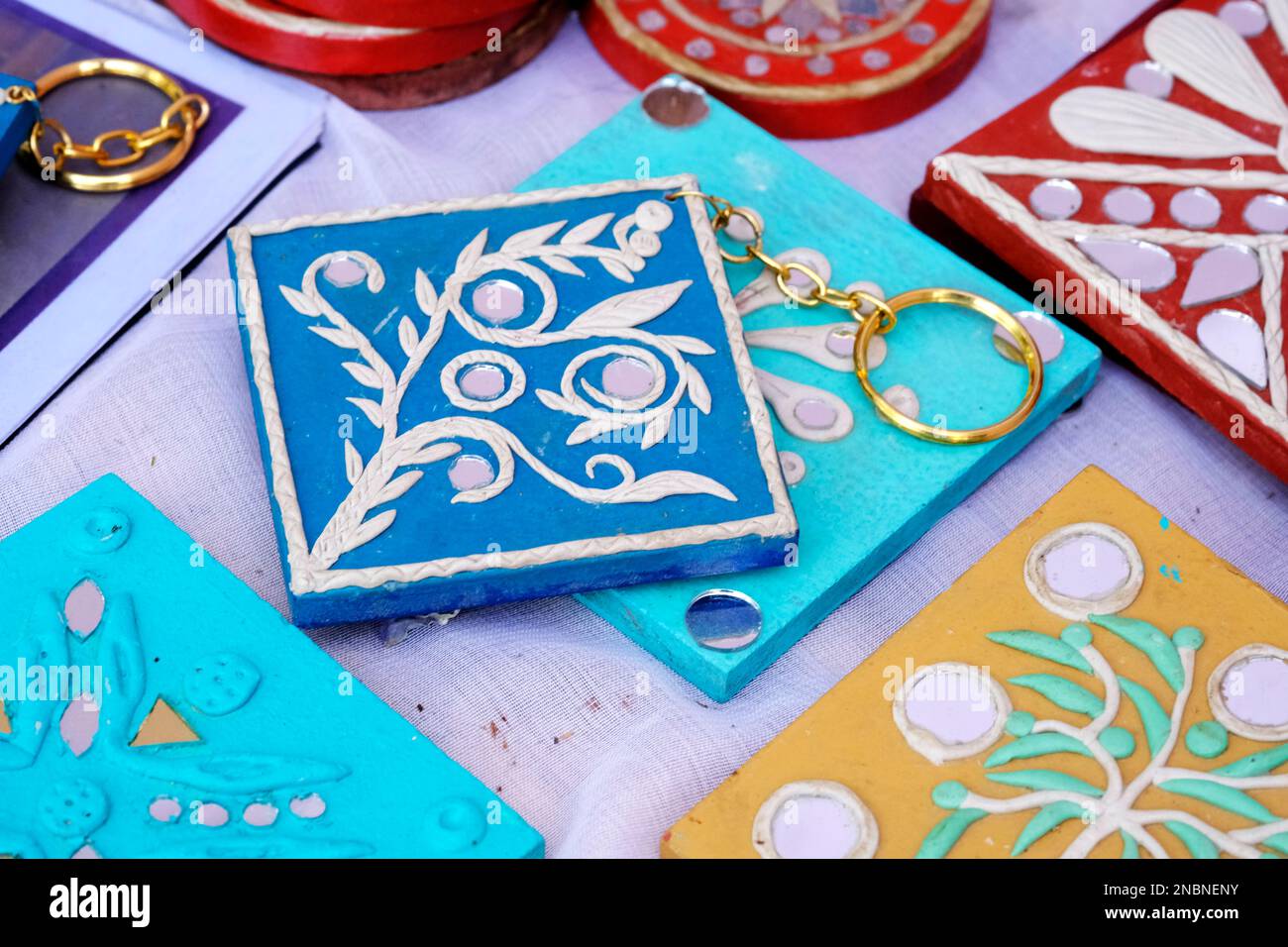 Pune, India, Handicraft items with selective focus, textile and wooden ...