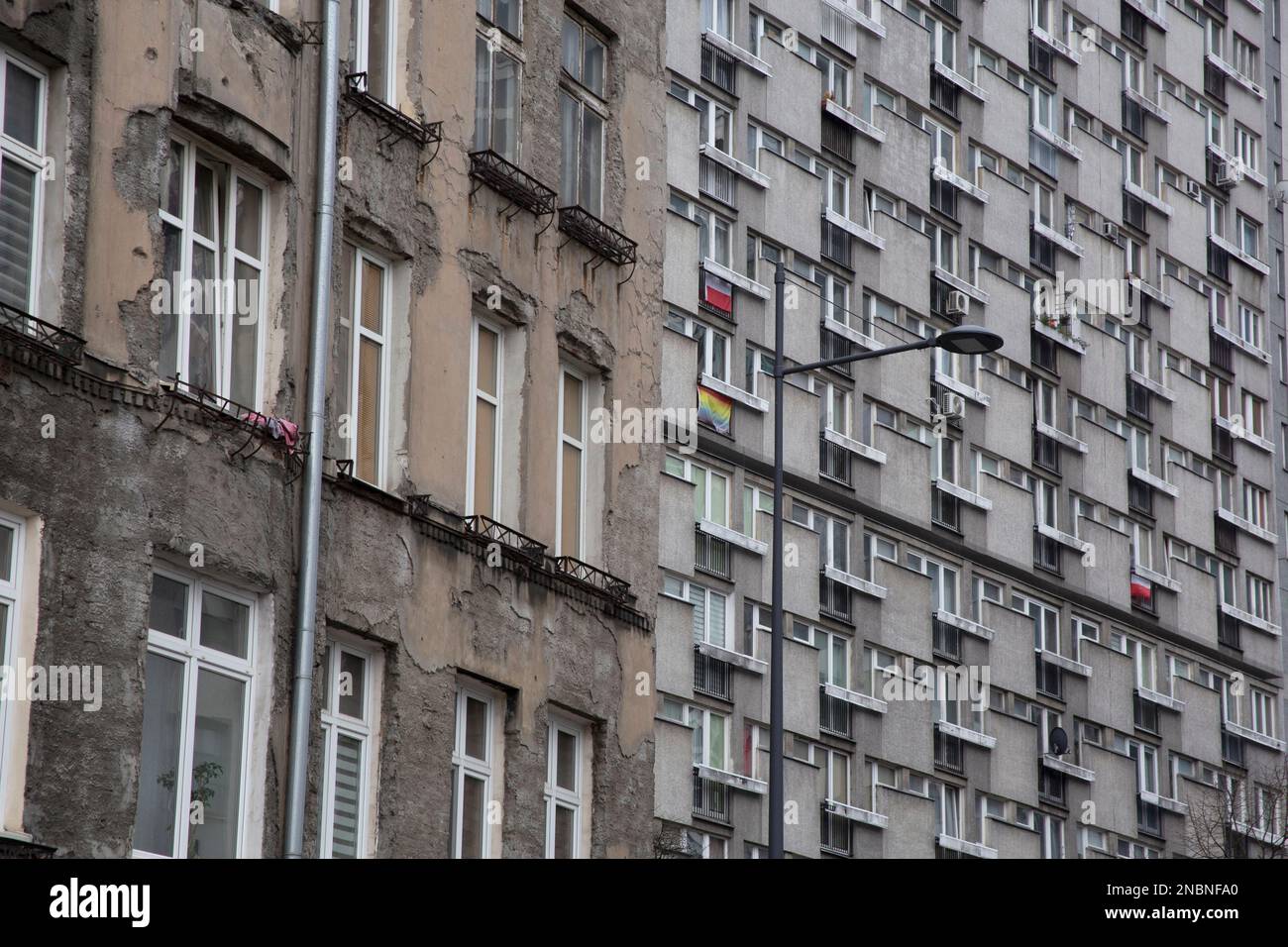Soviet-era apartment block next to an older tenement building in ...