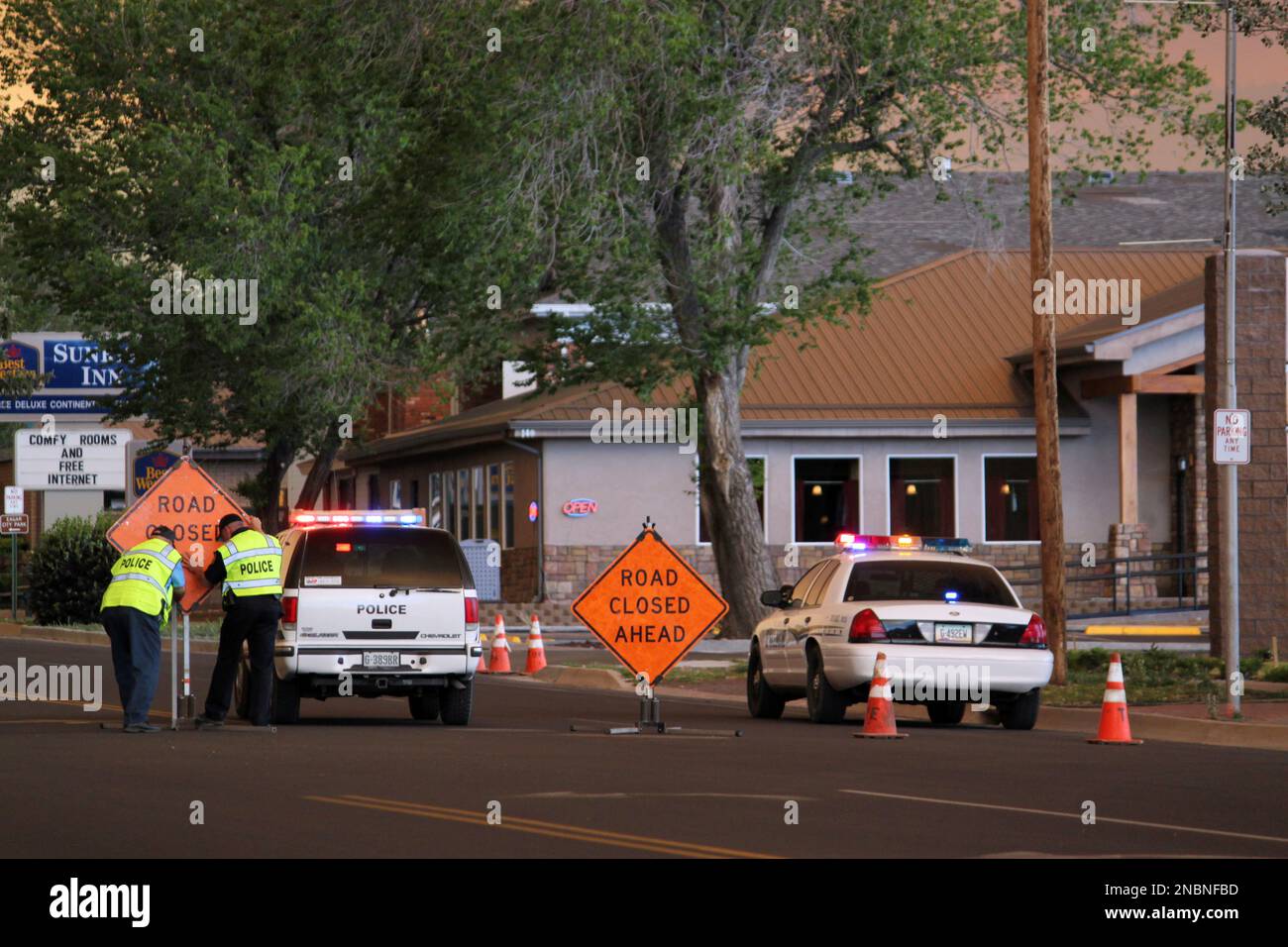 Authorities block the road heading to the southern half of Eagar, Ariz ...