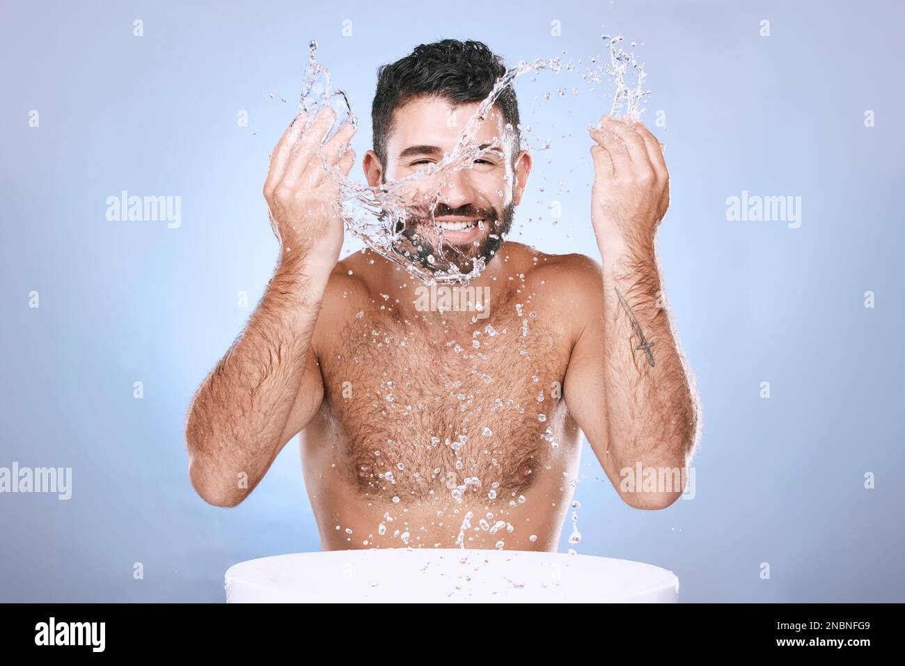 Water splash, skin care and portrait of man for clean spa facial for ...