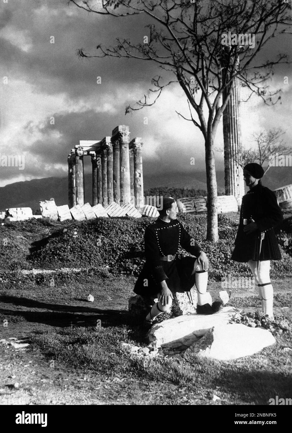 The temple of the Olympian Zeus, Athens, on May 3, 1939. Two troopers ...