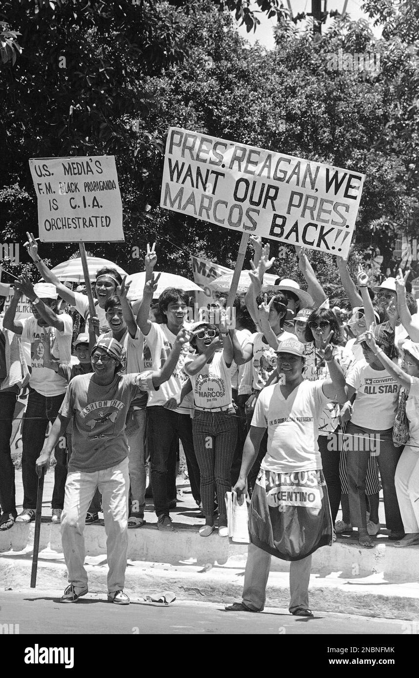 Supporters of ousted President Ferdinand Marcos continue their picket ...