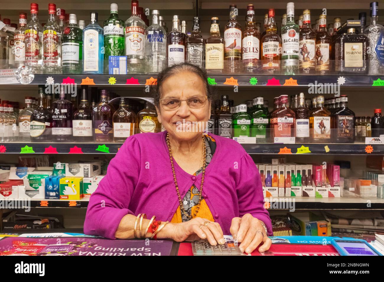 England, London, Elderly Indian Lady in Mini-market Store Stock Photo ...