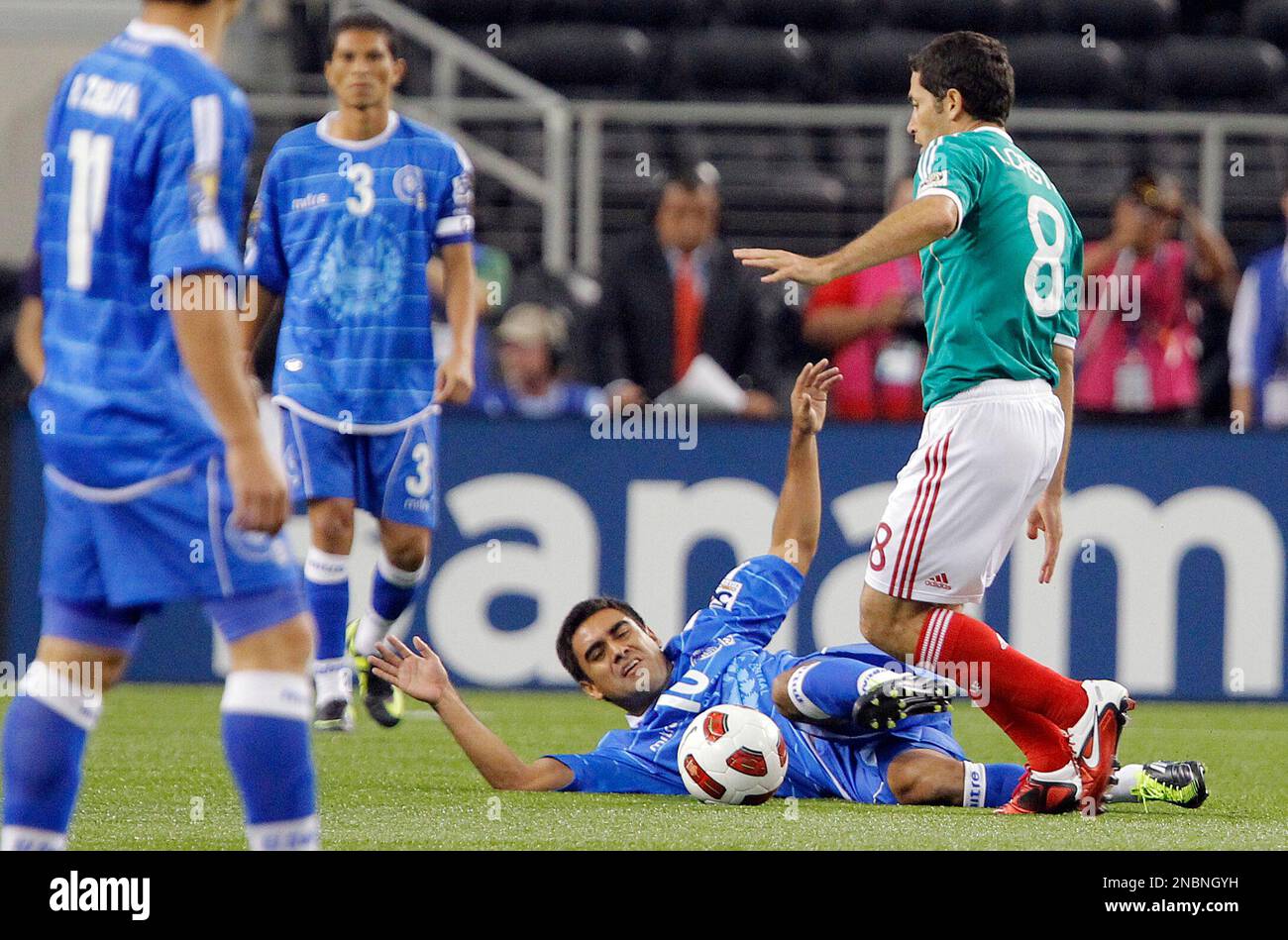 Mexico's Midfielder Israel Castro (8) and El Salvador's Attacker Eliseo ...