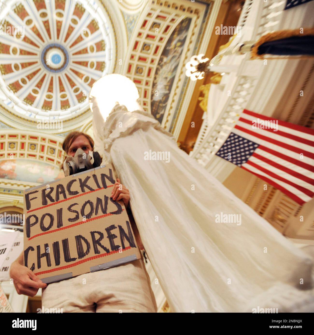 Environmental protester John Nicholson participates in a rally at the ...