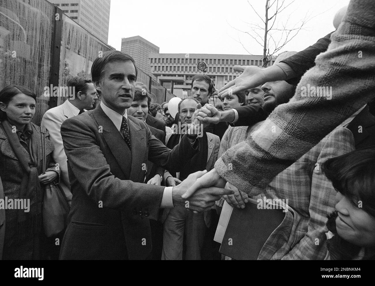 California Gov. Edmund G. Brown Jr., works a sea of offered hands as he ...