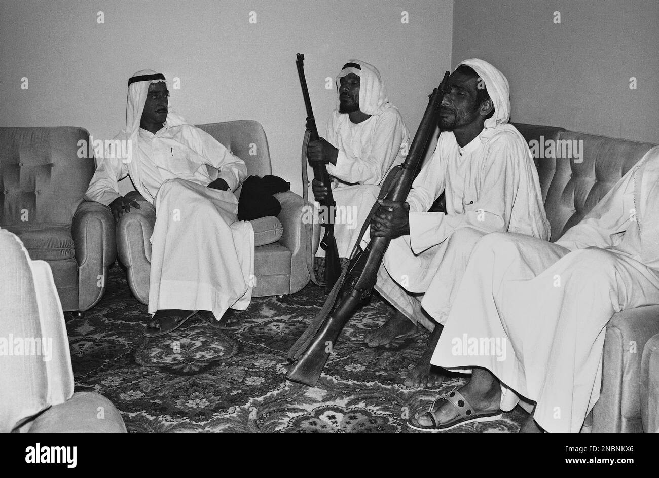 Sheiks, falconers and guards during an audience at the palace in ...