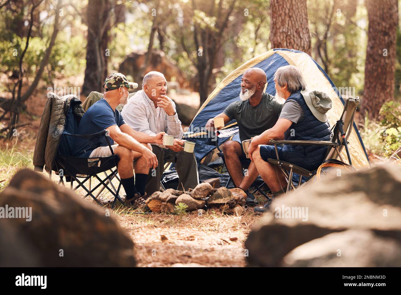 Senior people, camping and relaxing in nature for travel, adventure or ...