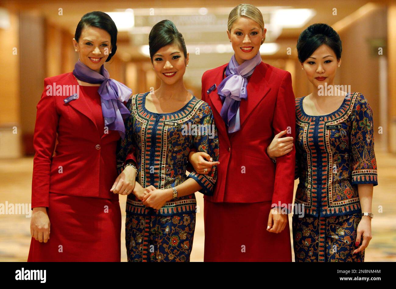 Virgin Australia group of airlines hostesses, left and third from left ...