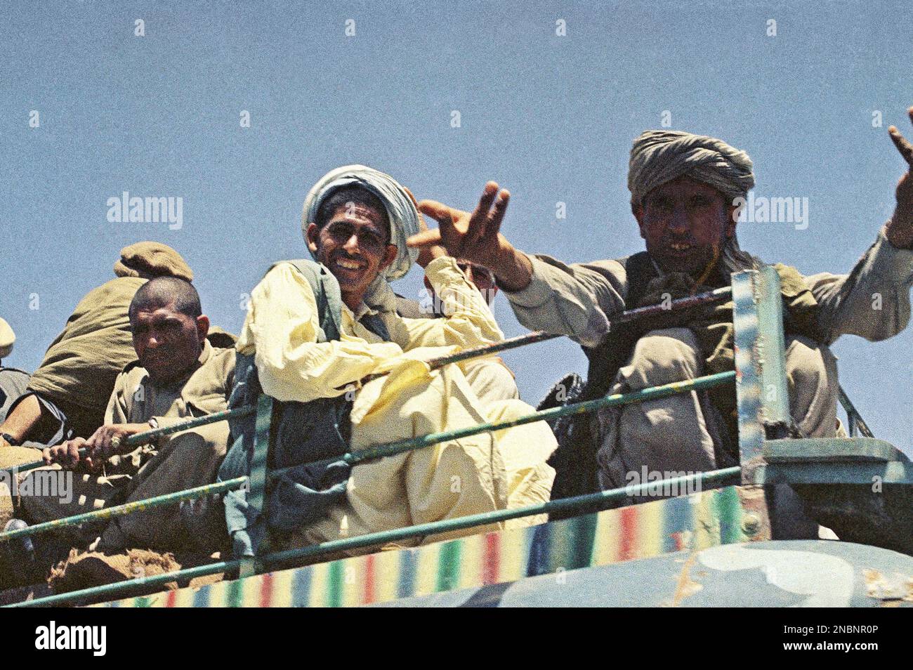 A truckload of Pathans in a little mountain town near the Afghan ...