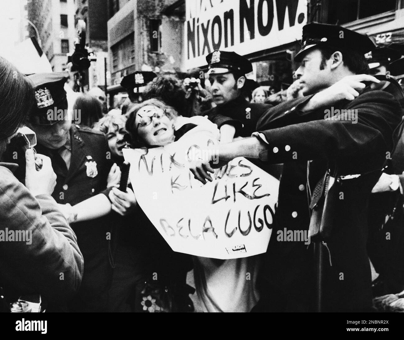 Ti-Grace Atkinson, a leader in the feminist movement, wearing sign, is ...
