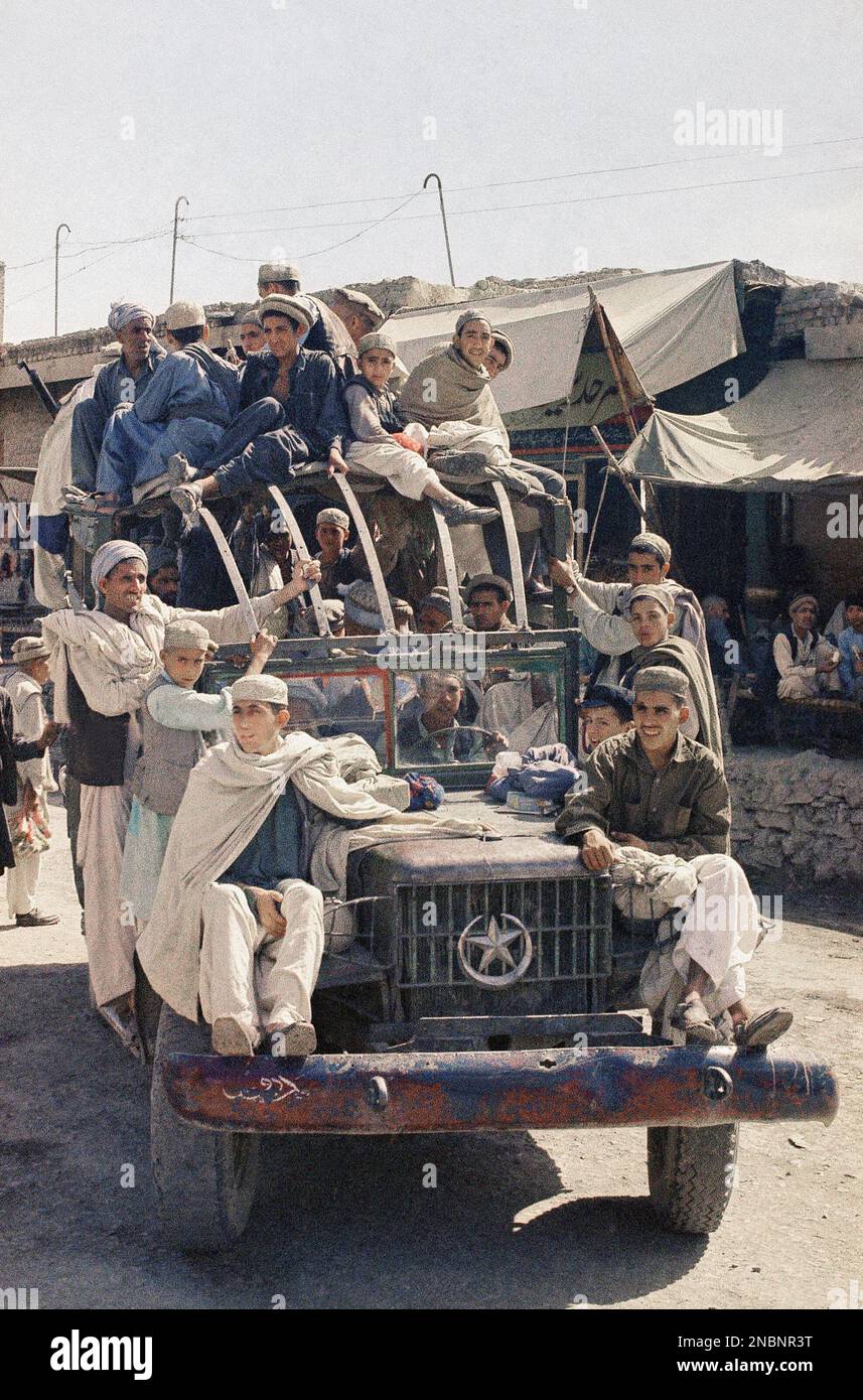 A truckload of Pathans in a little mountain town near the Afghan ...
